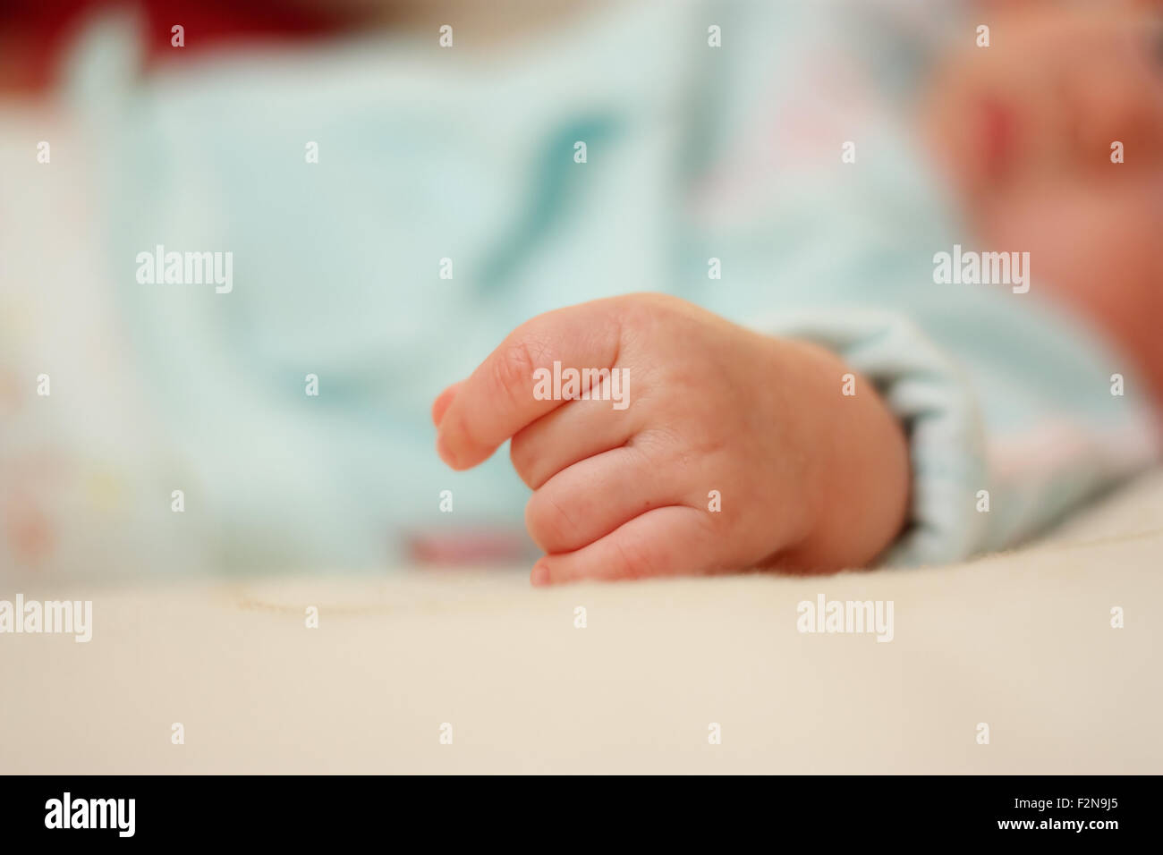 Newborn fist hi-res stock photography and images - Alamy