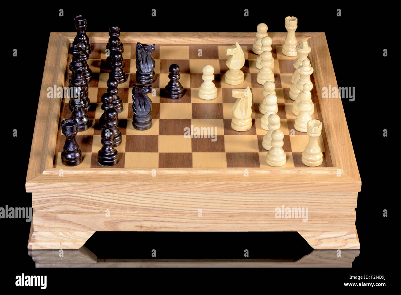 Popular game of chess with pieces Stock Photo - Alamy