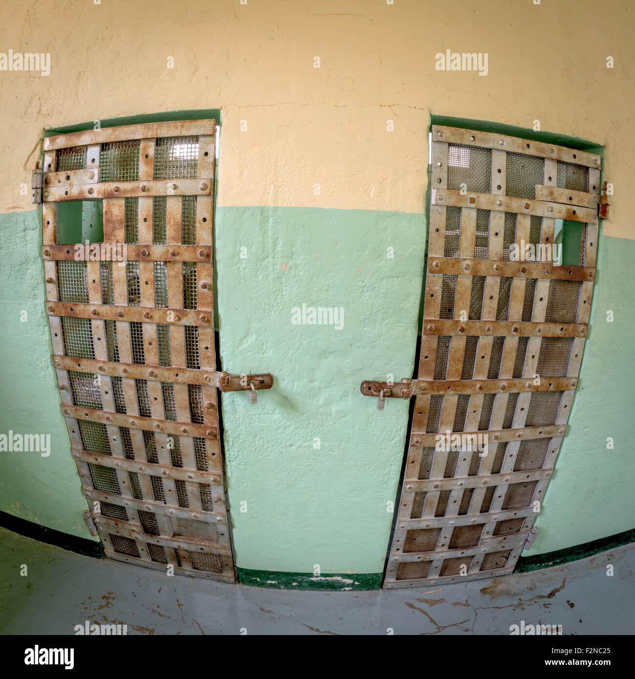 Two fail cell bars doors in a prison Stock Photo - Alamy
