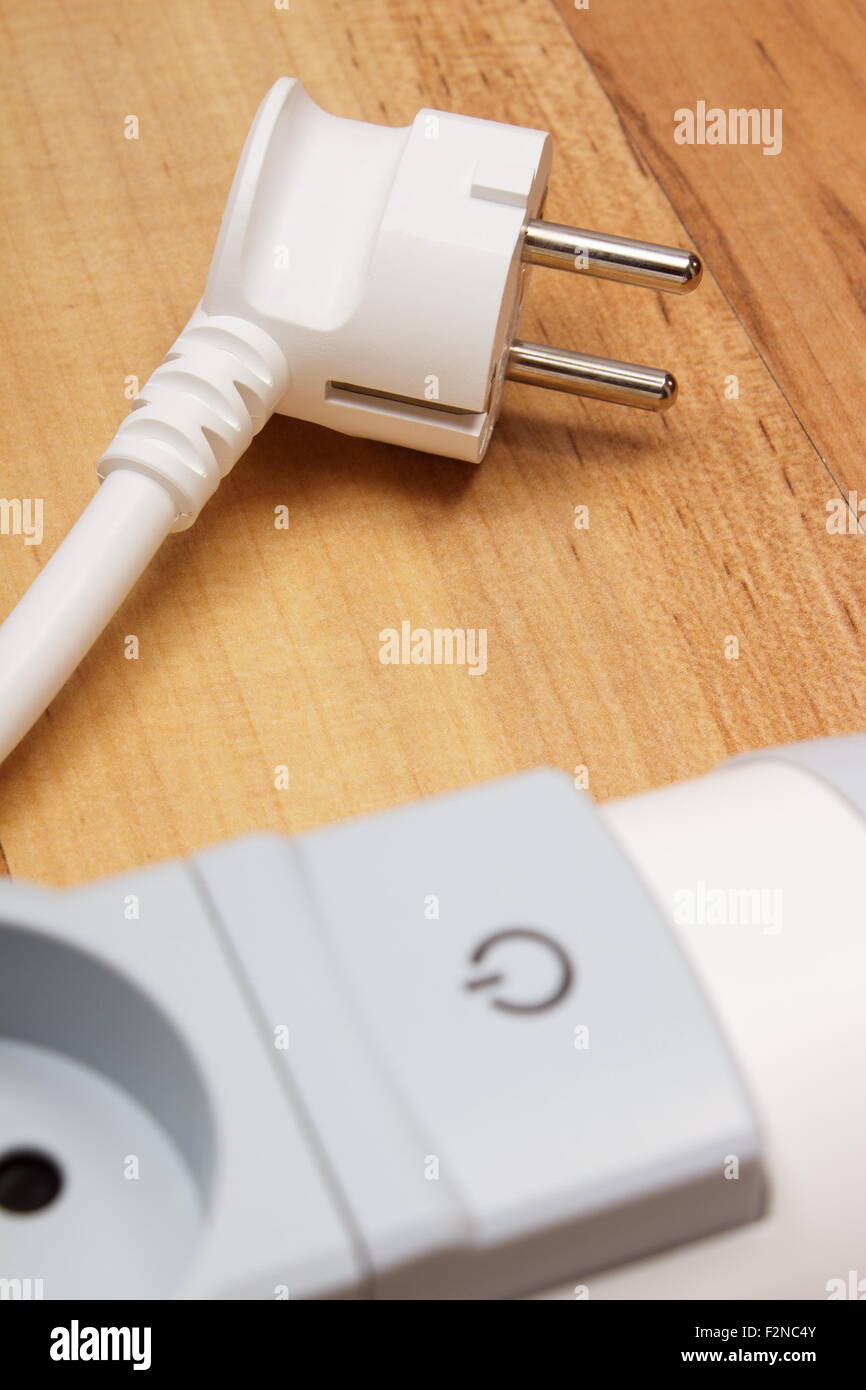 Electrical power strip with switch on-off on wooden floor, electrical ...