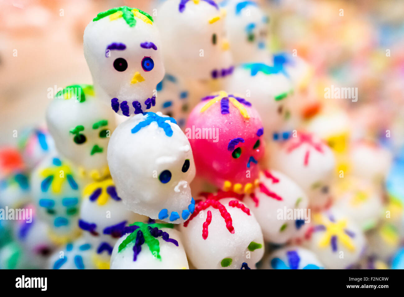 Colorful sugar skull candies are sold on the market during the Day of ...