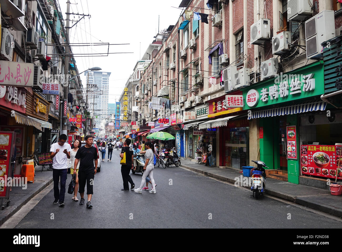 A street with several small shops in Shanghai, China, 01 September ...