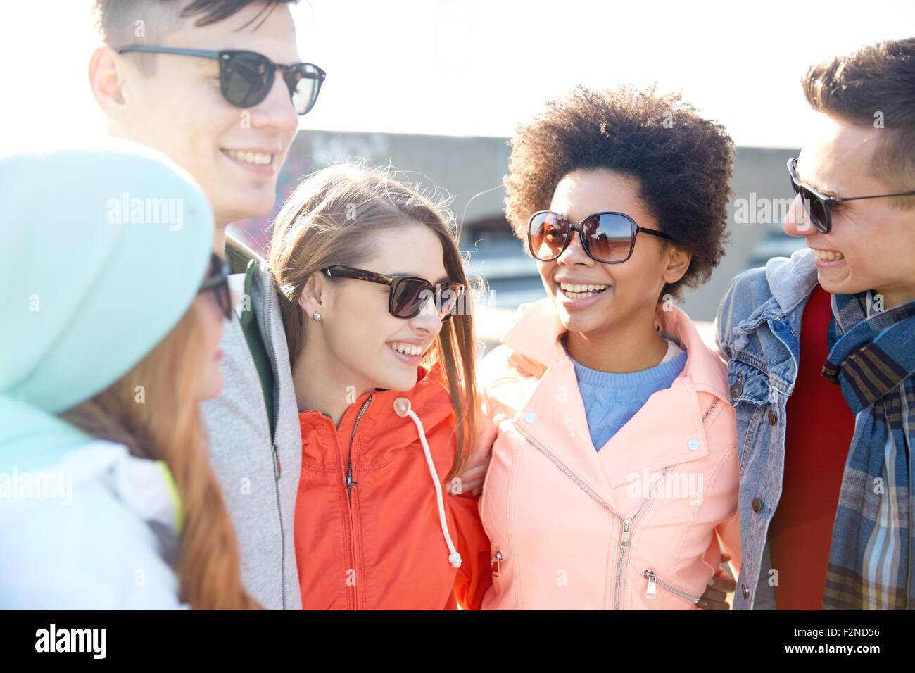 Teenagers talking street hi-res stock photography and images - Alamy