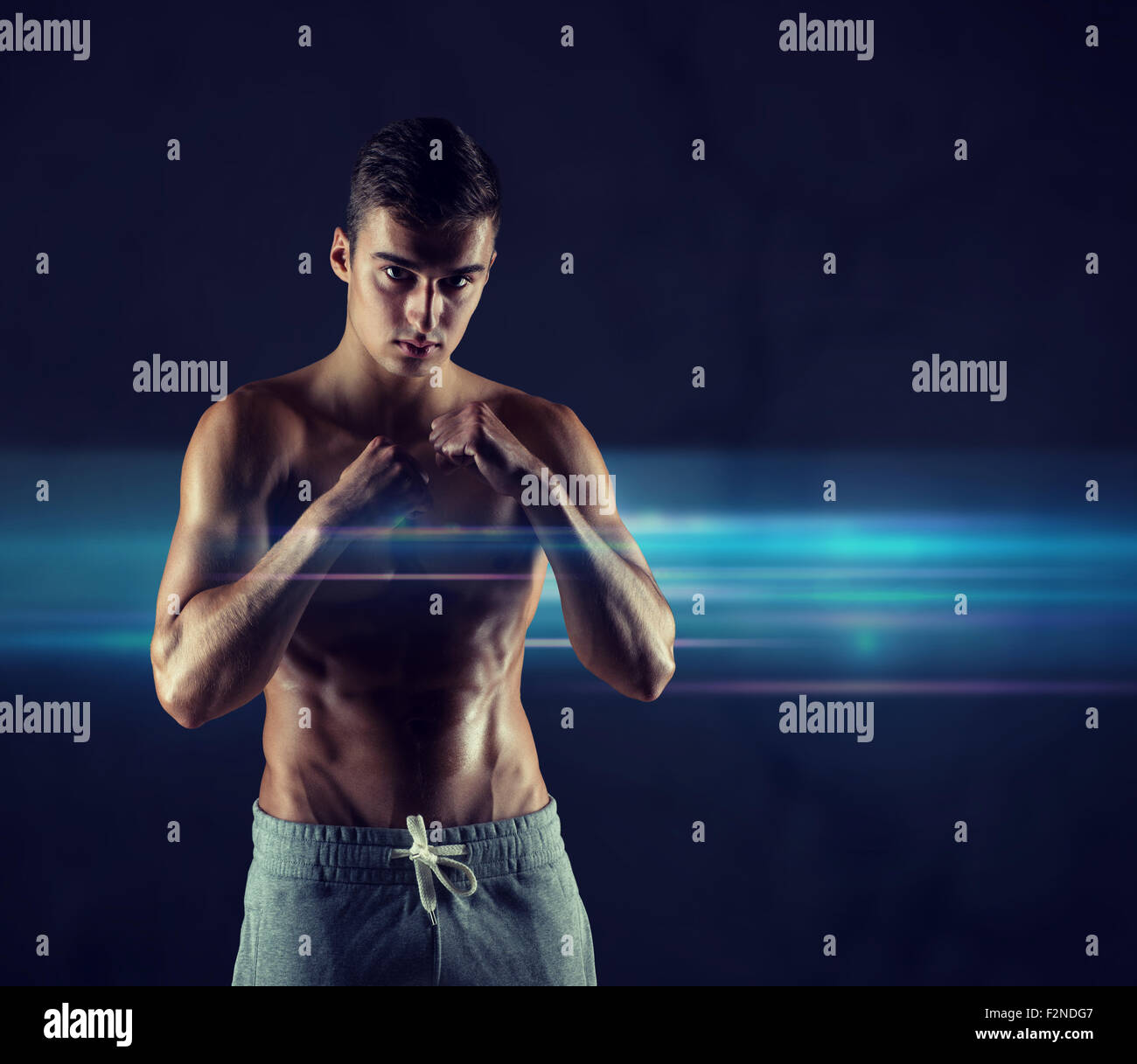 young man in fighting or boxing position Stock Photo - Alamy
