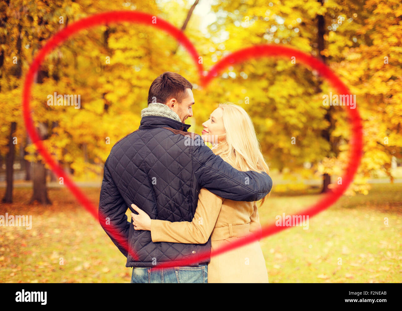 romantic couple kissing in the autumn park Stock Photo - Alamy