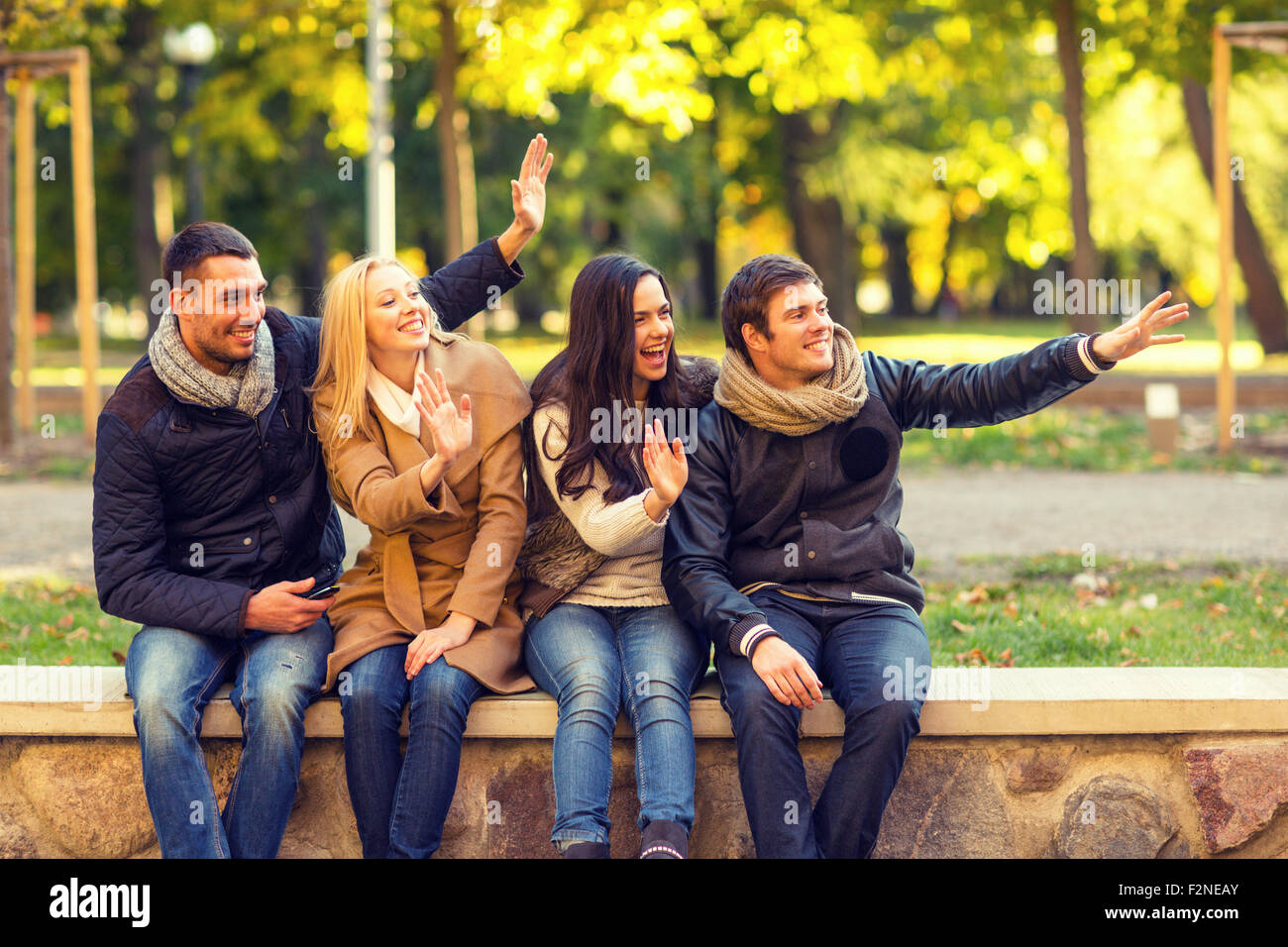 People Waving Goodbye To Each Other