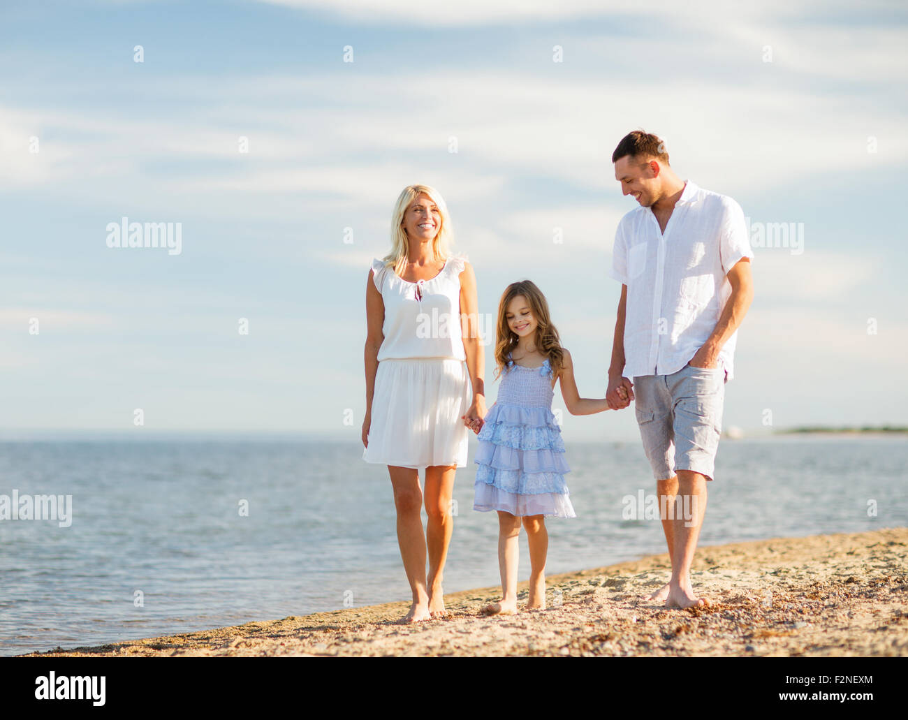 happy family at the seaside Stock Photo - Alamy