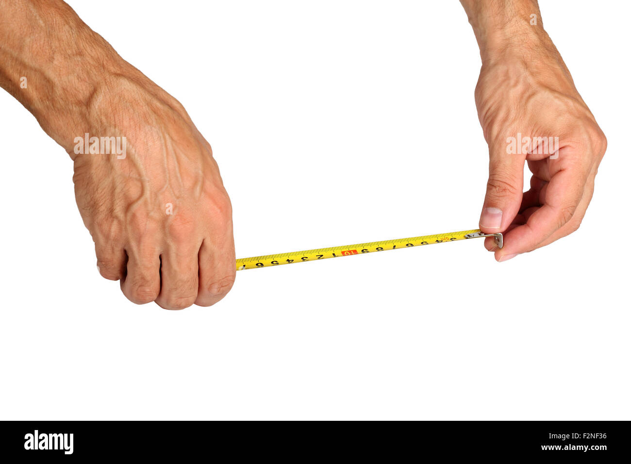 Man holding tape measure. Isolated with clipping path Stock Photo - Alamy