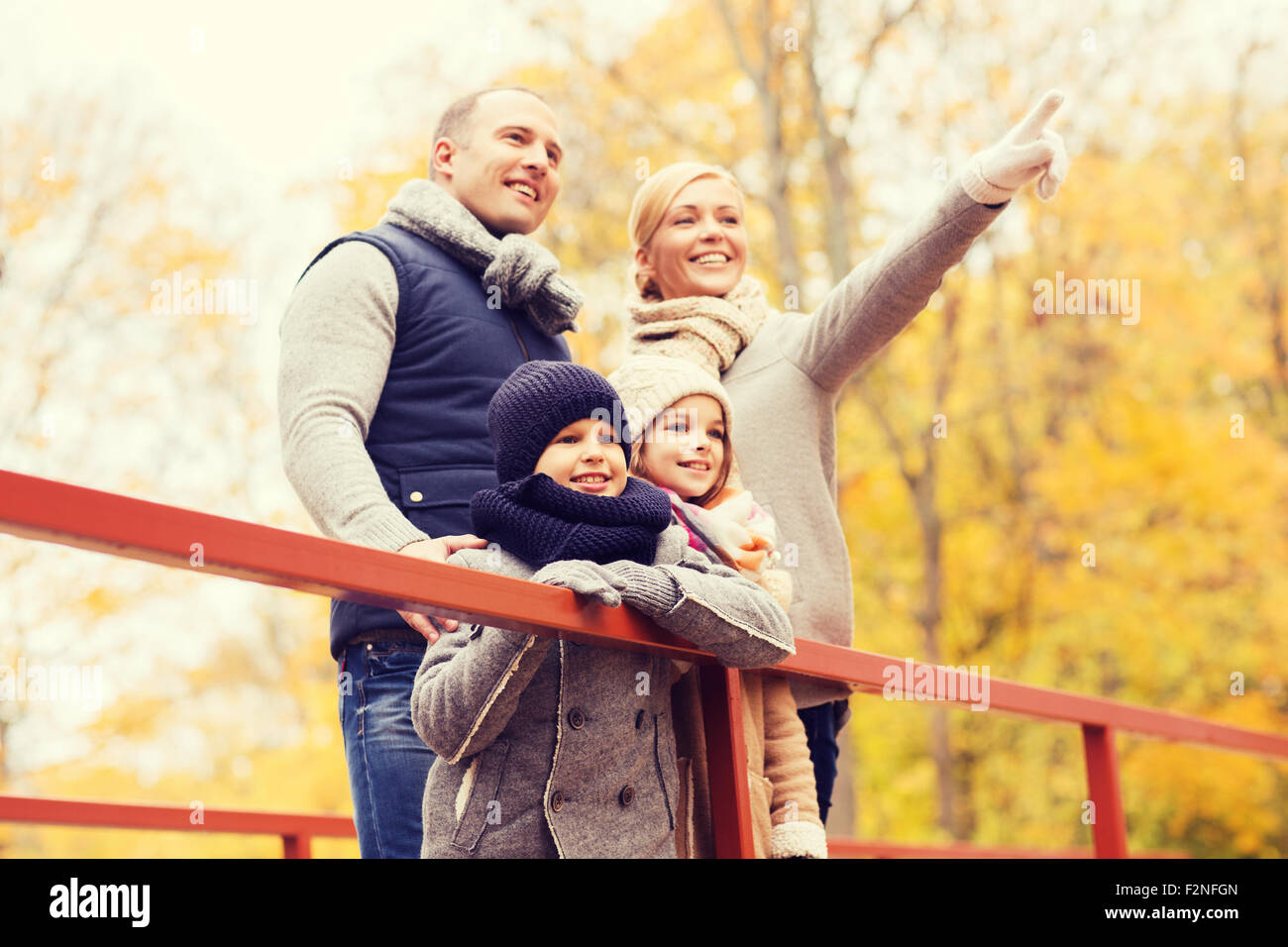 happy family in autumn park Stock Photo - Alamy