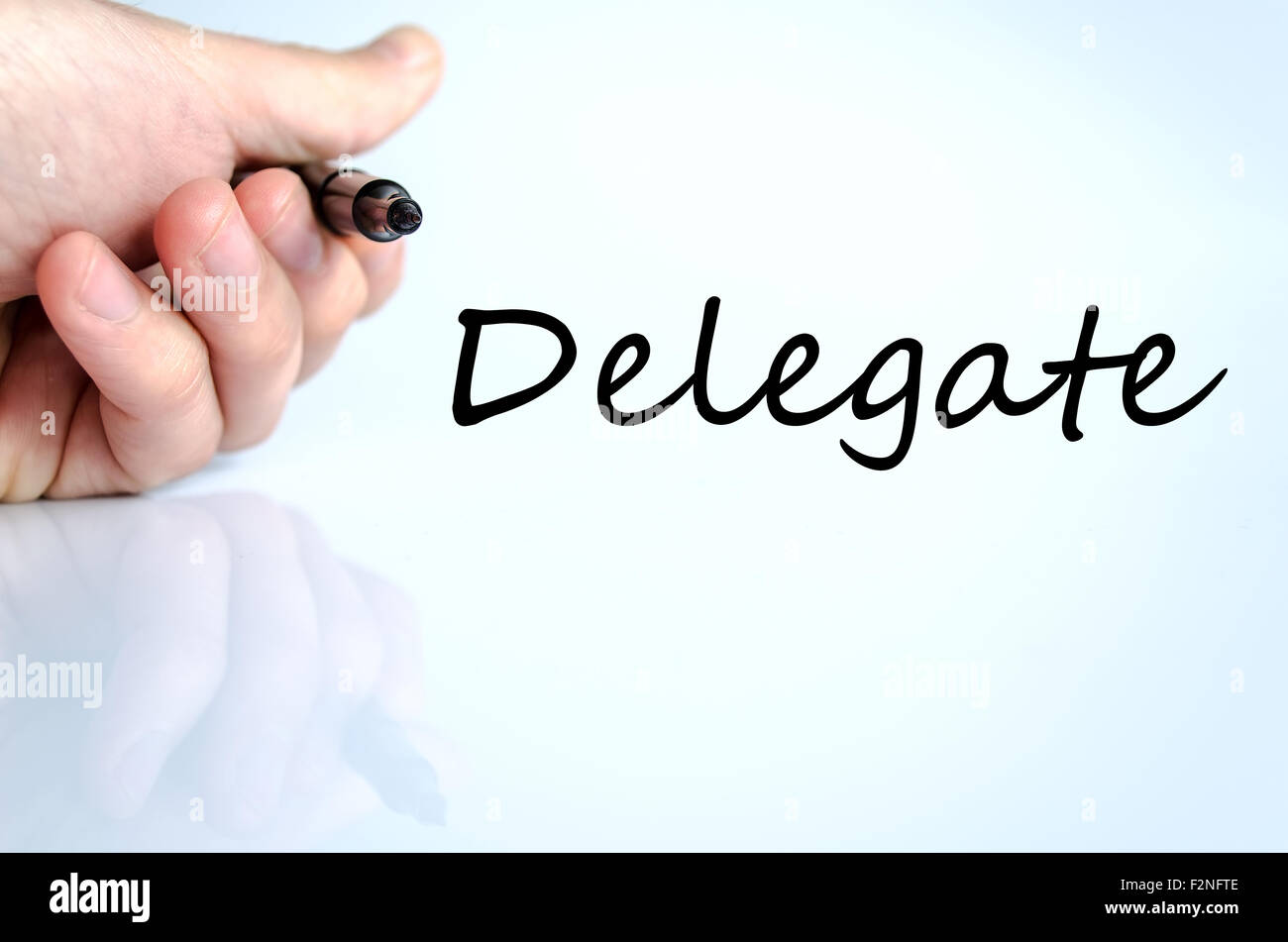 Delegate text concept isolated over white background Stock Photo - Alamy