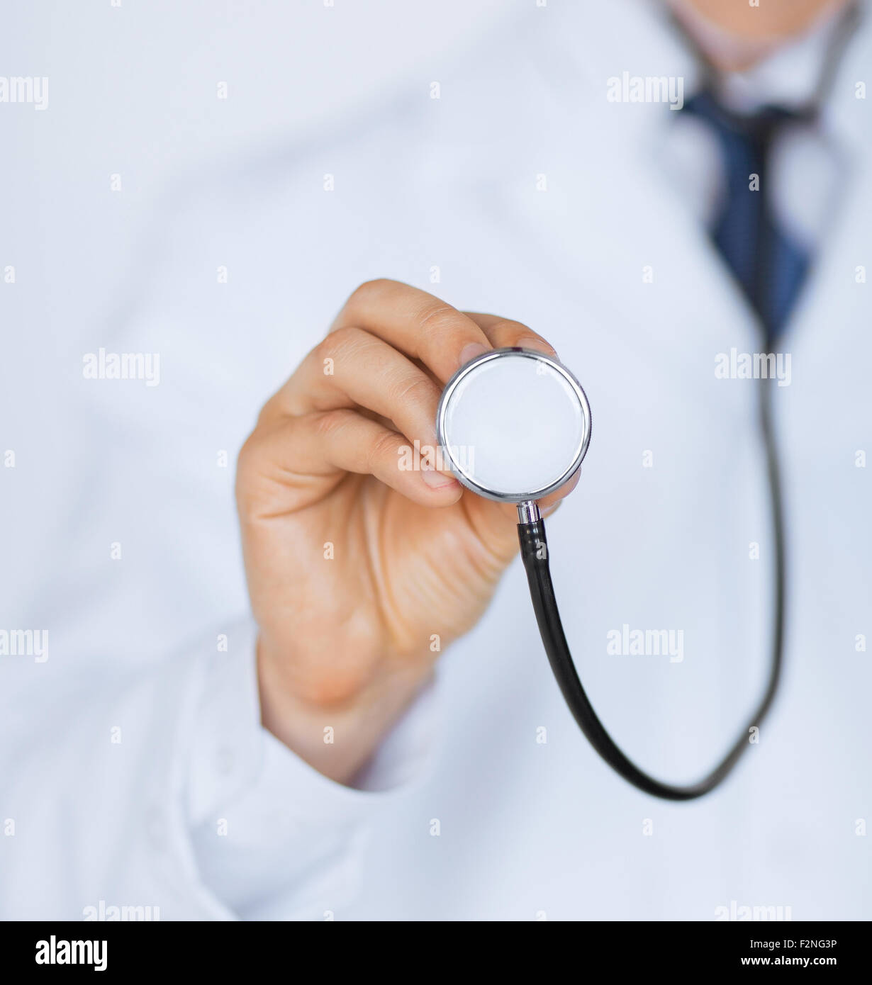 doctor hand with stethoscope listening something Stock Photo - Alamy