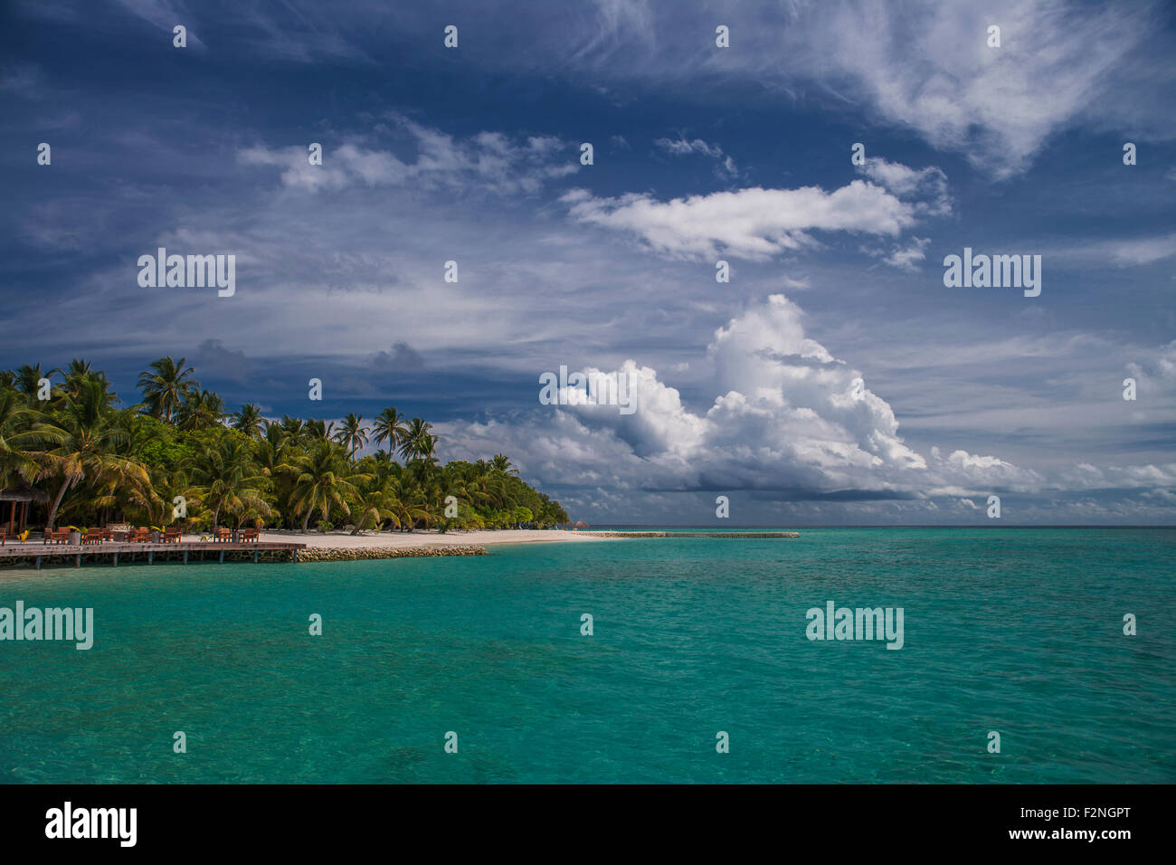 Clouds over tropical island Stock Photo - Alamy
