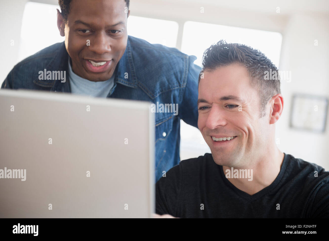 Men using computer in office Stock Photo - Alamy