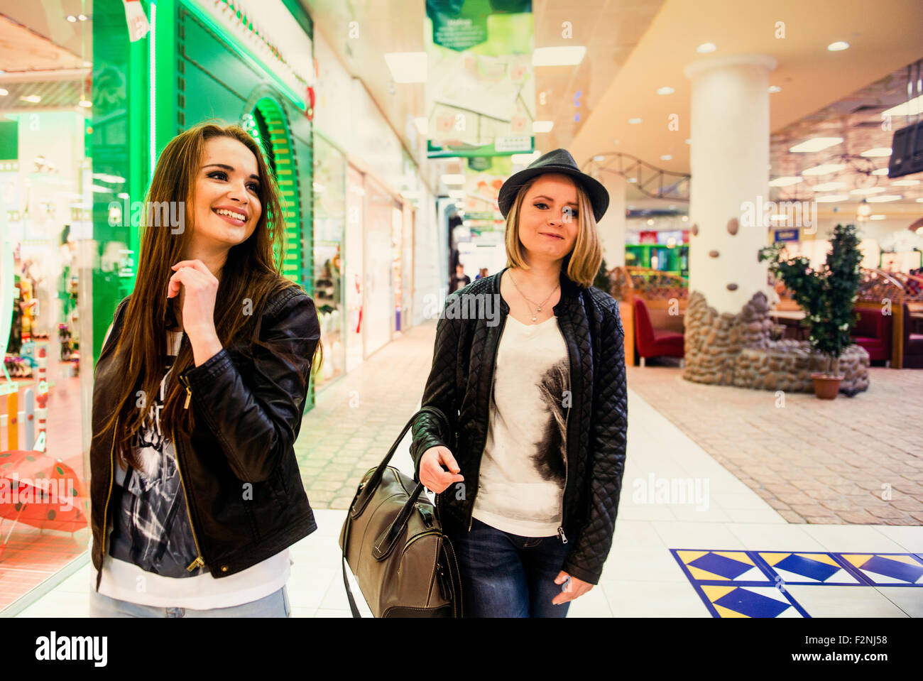 Lady walking in mall hi-res stock photography and images - Alamy