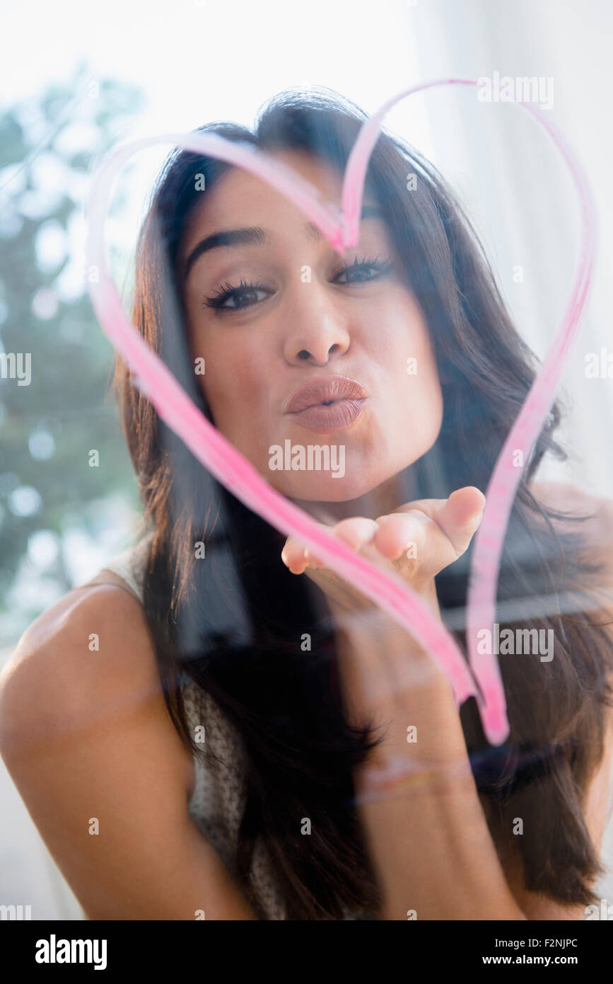 Blowing kiss lipstick hi-res stock photography and images - Alamy