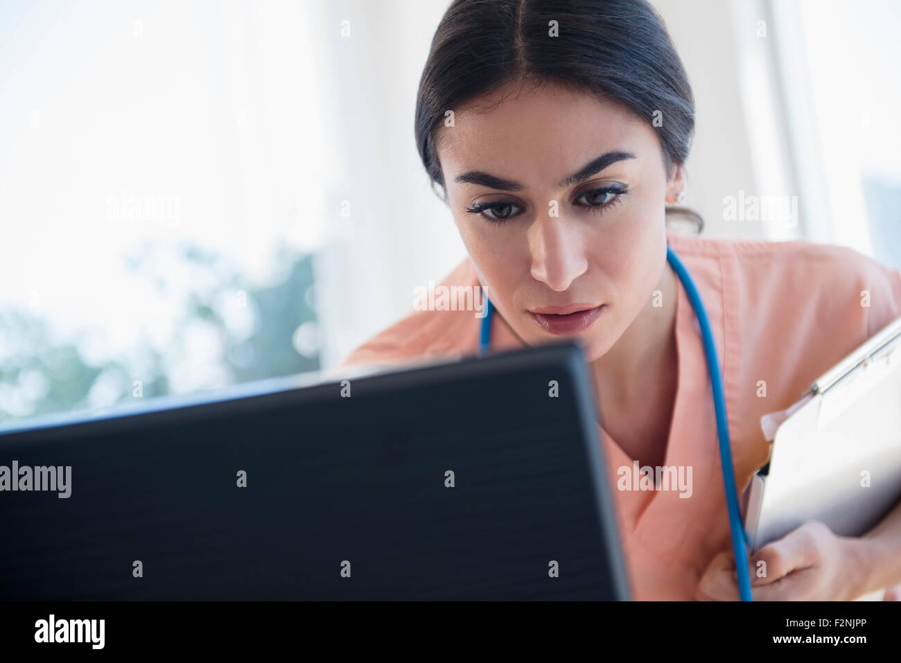 Nurse using computer in hospital Stock Photo - Alamy
