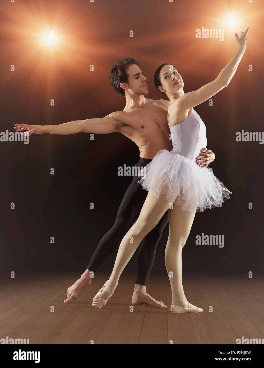Hispanic ballet dancers performing on stage Stock Photo - Alamy