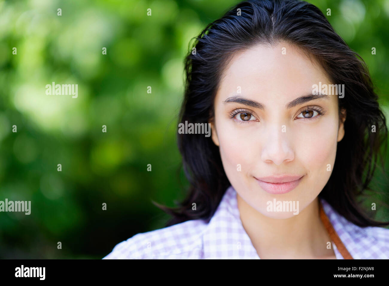 Beautiful hispanic woman standing hi-res stock photography and images ...