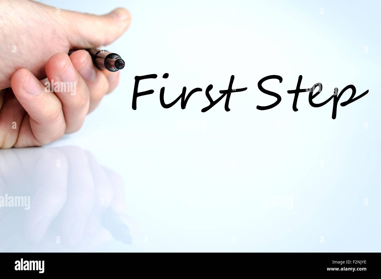 First step text concept isolated over white background Stock Photo - Alamy