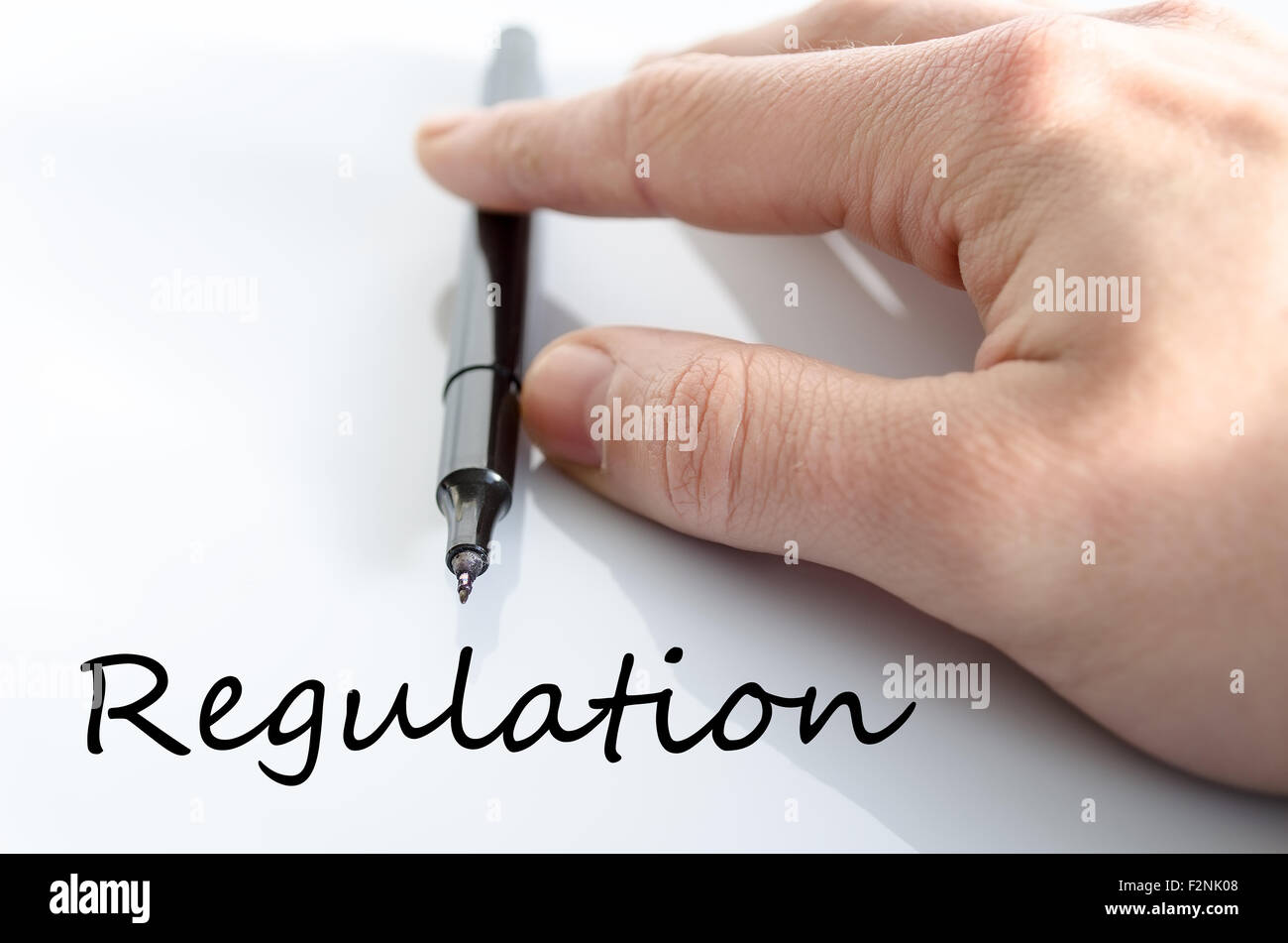 Regulation text concept isolated over white background Stock Photo - Alamy