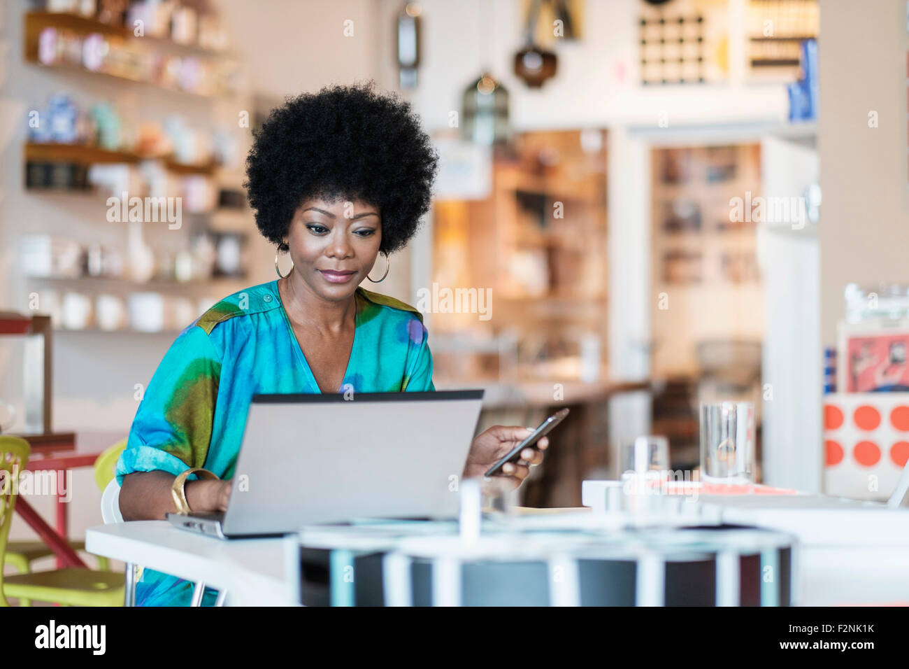 African shop owner computer hi-res stock photography and images - Alamy