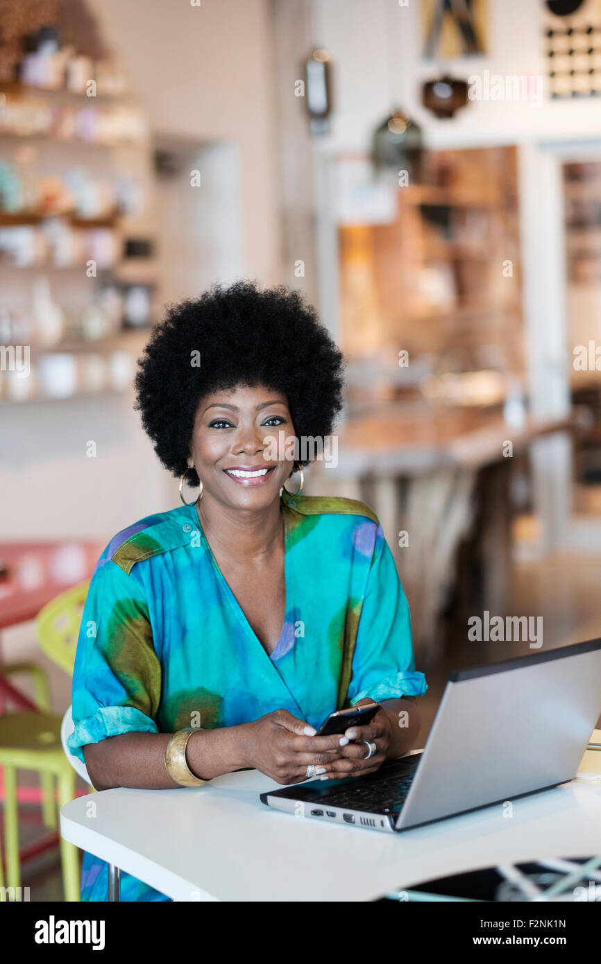 African shop owner computer hi-res stock photography and images - Alamy