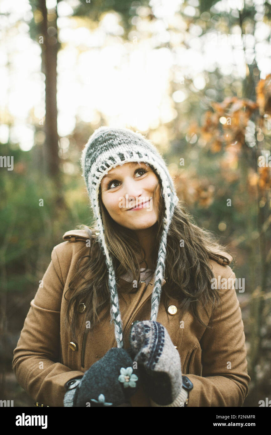 Smiling woman wearing cap in hi-res stock photography and images - Alamy