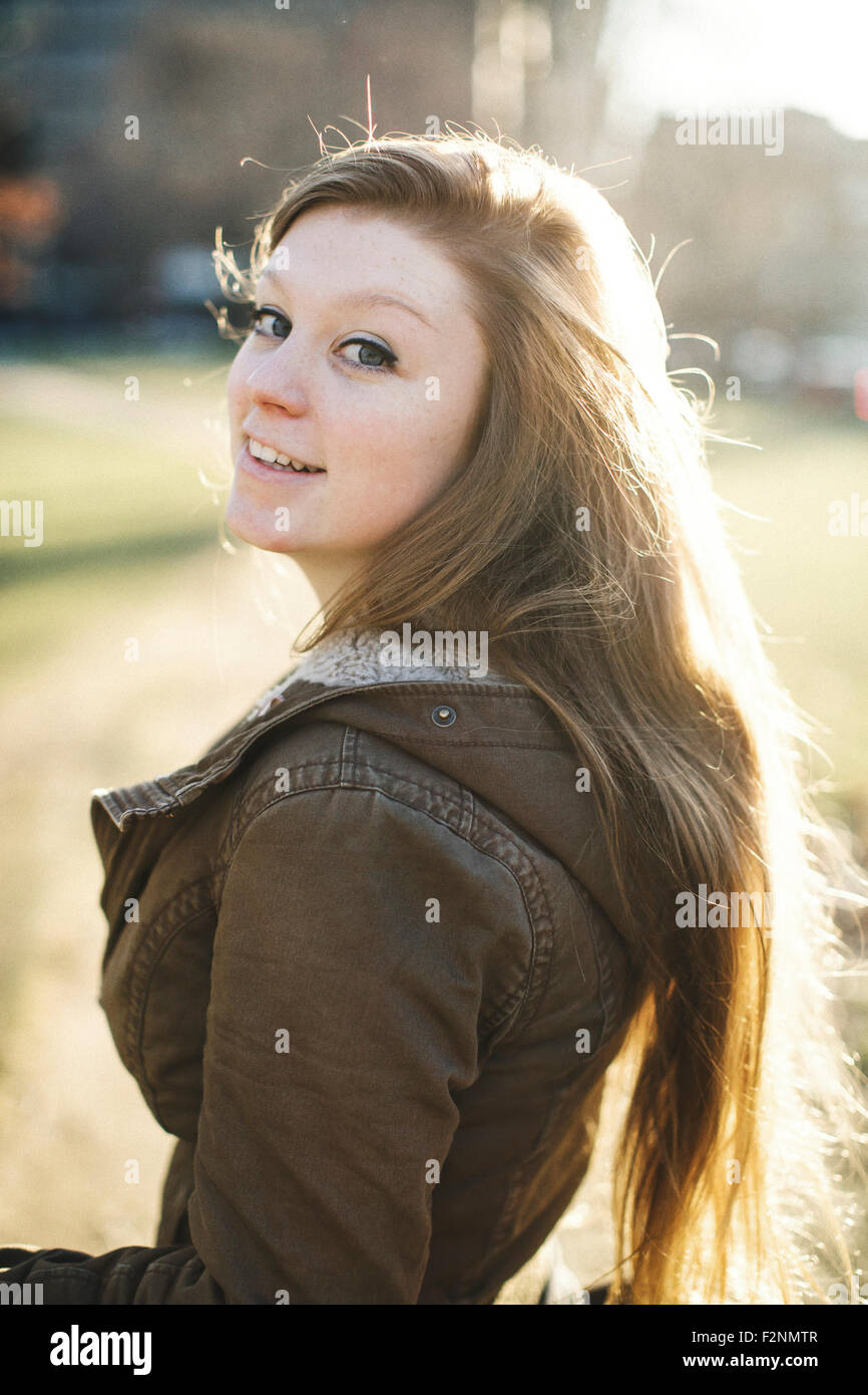 Caucasian woman standing in park Stock Photo - Alamy