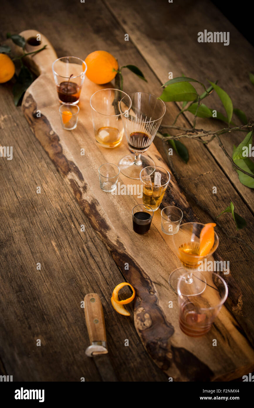 Variety of cocktails on wooden board Stock Photo - Alamy