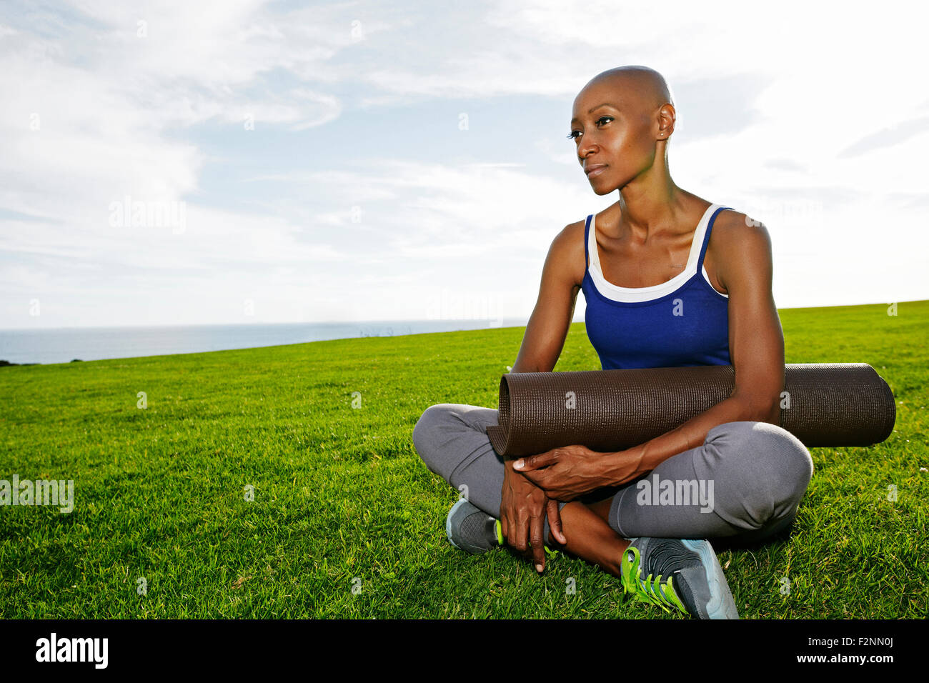 African woman sitting cross legged hi-res stock photography and images ...