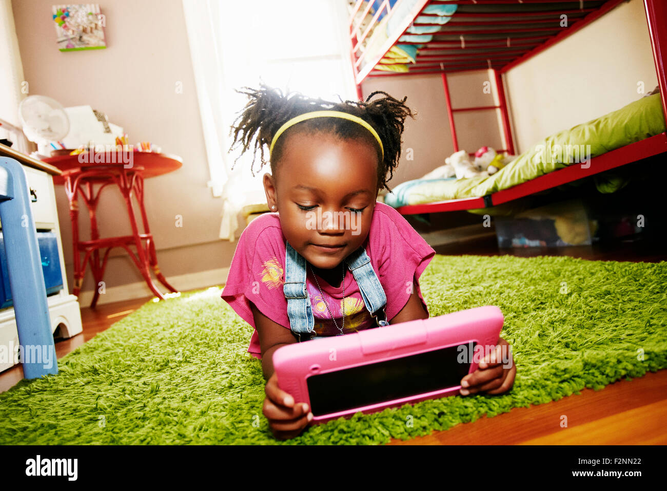 Black child tablet hi-res stock photography and images - Alamy