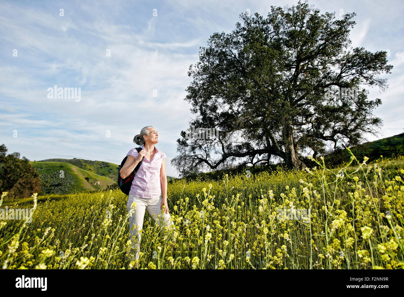 Tall woman standing hi-res stock photography and images - Alamy