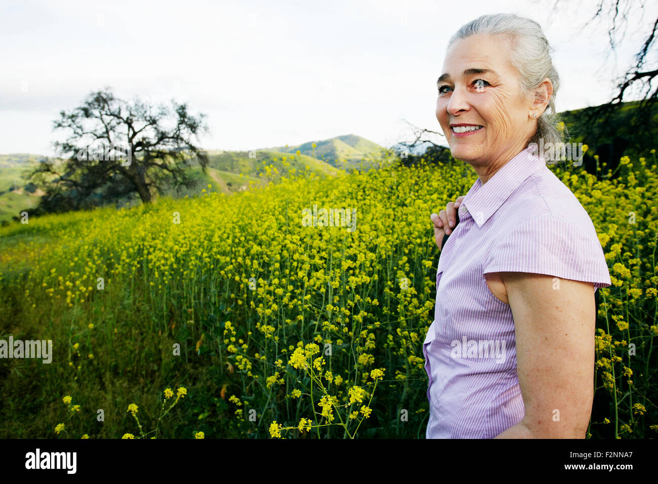 Tall woman standing hi-res stock photography and images - Alamy