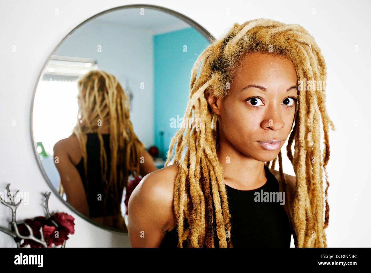 Woman with long dreadlocks hi-res stock photography and images - Alamy