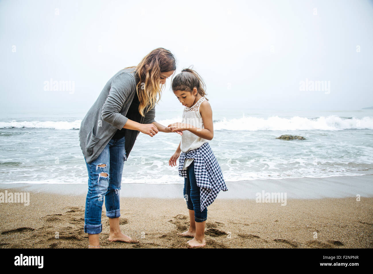 Child standing barefoot hi-res stock photography and images - Alamy