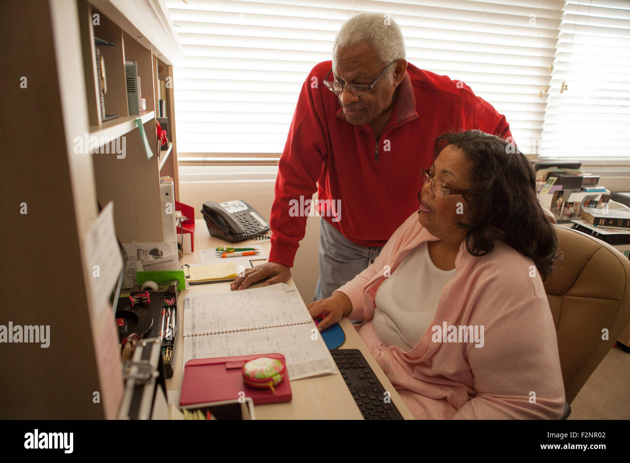 Using computer at home hi-res stock photography and images - Alamy