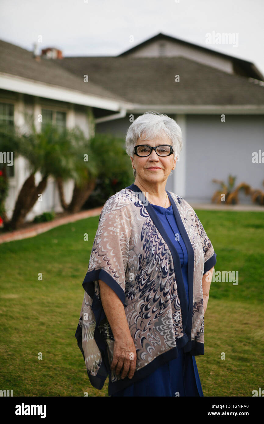 Portrait older woman standing on hi-res stock photography and images ...