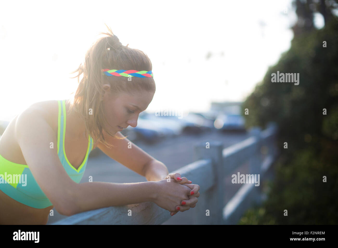 Leaning over railing hi-res stock photography and images - Alamy