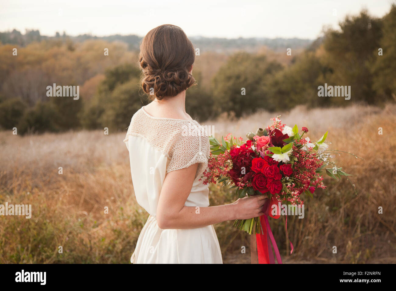 Young bride holding bridal bouquet hi-res stock photography and images ...