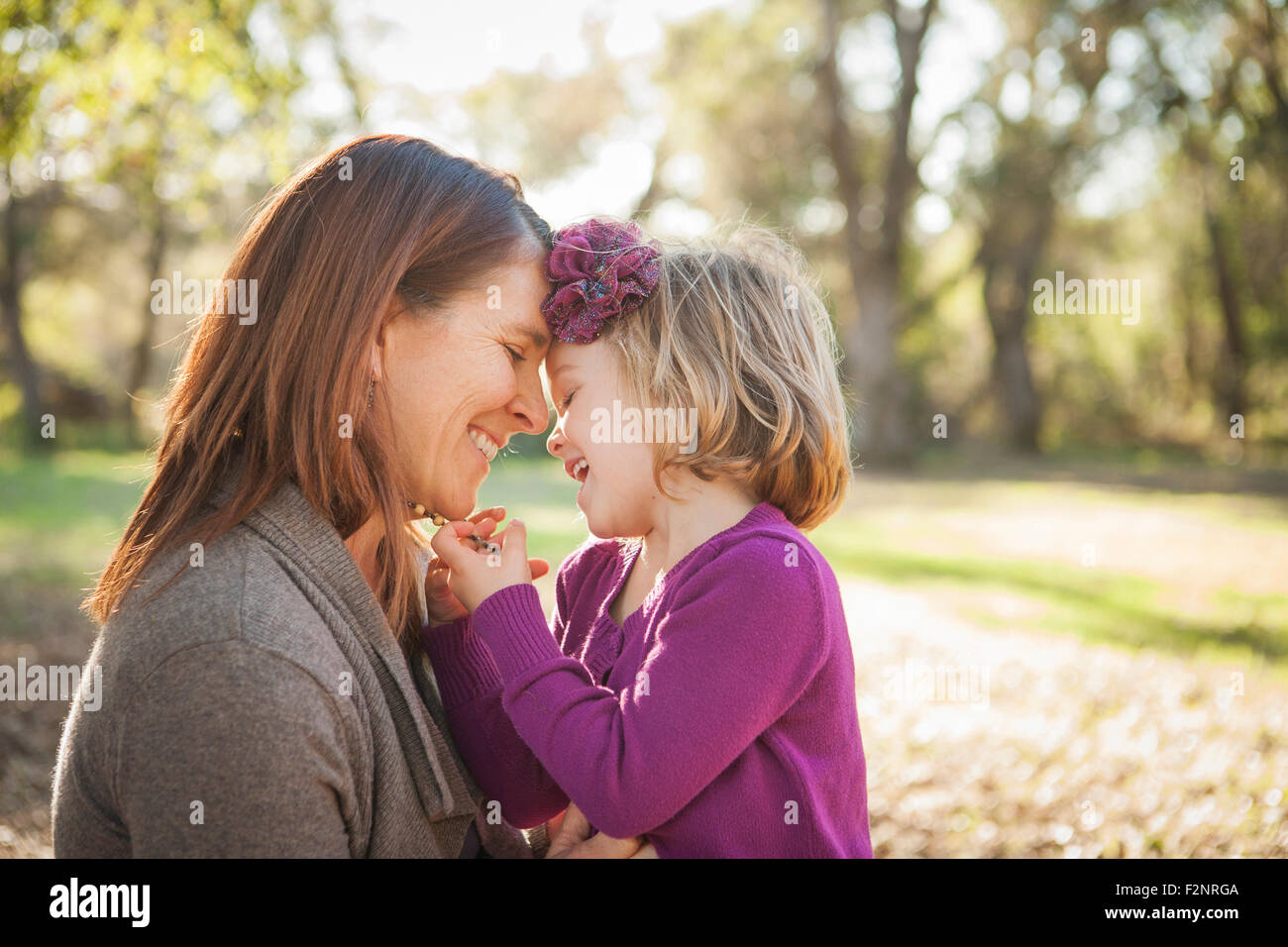 Mum hugging children hi-res stock photography and images - Alamy