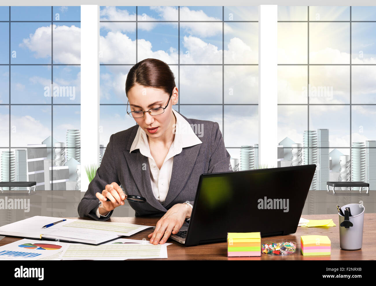 Business woman using laptop Stock Photo - Alamy