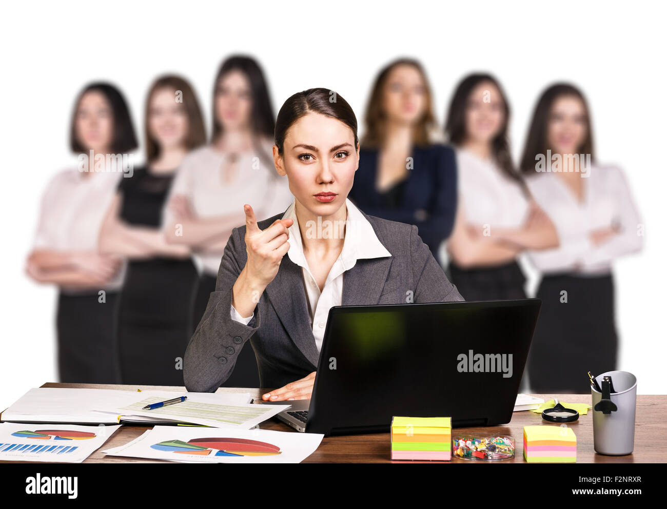 Businesswoman sitting at the table and thinking Stock Photo - Alamy