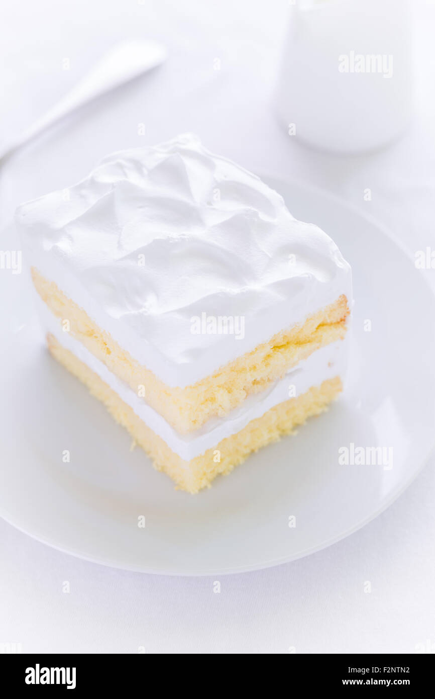 White cake for tea break moment on white background Stock Photo - Alamy