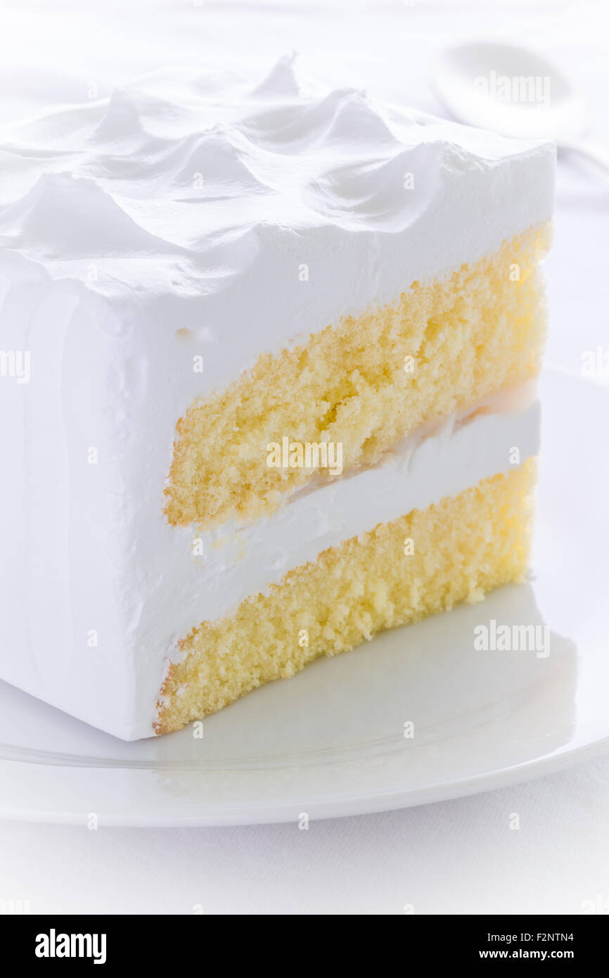 White cake for tea break moment on white background Stock Photo - Alamy