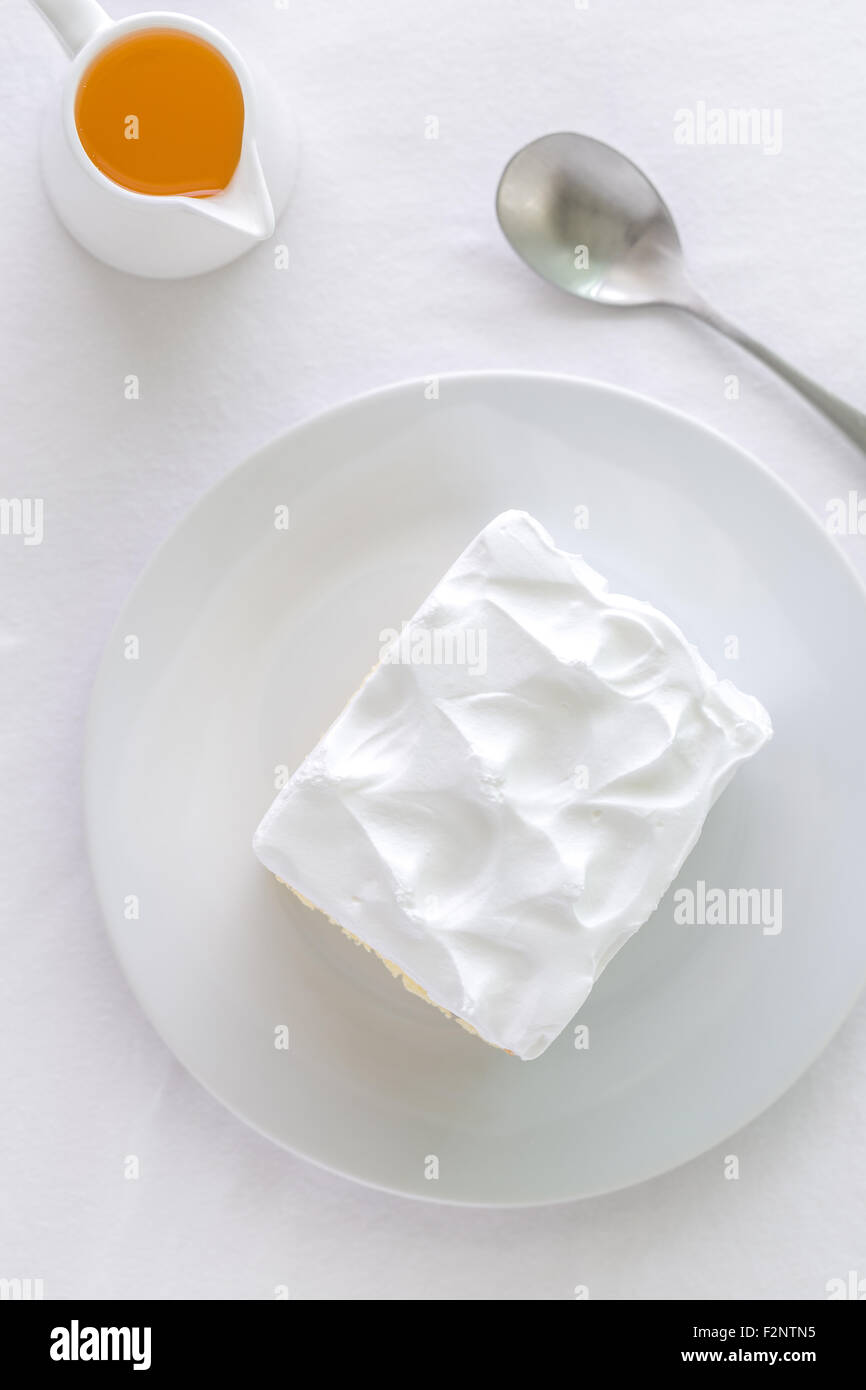 White cake for tea break moment on white background Stock Photo - Alamy