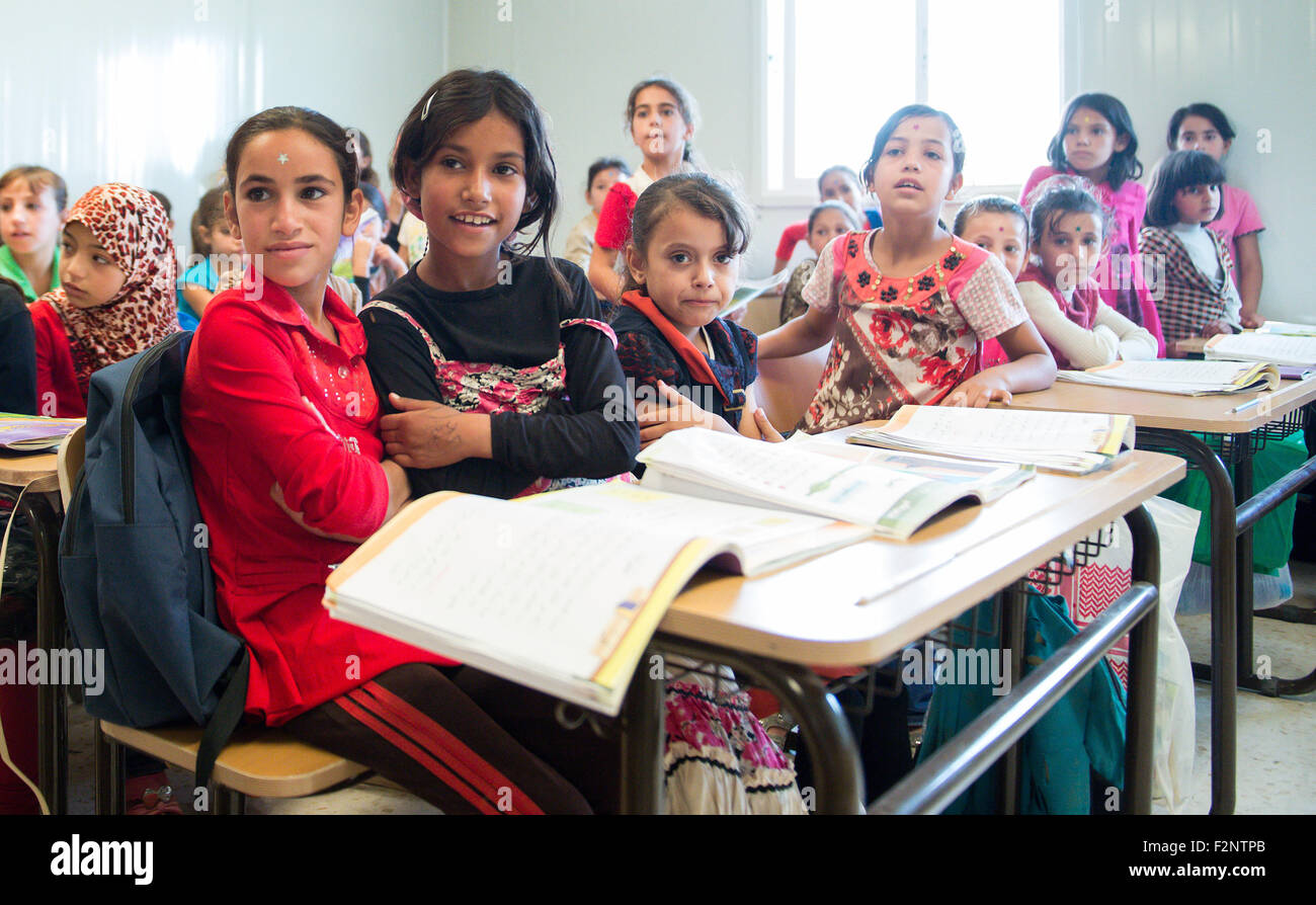 Syrian refugee schildren attend a class at the UNICEF school on the ...