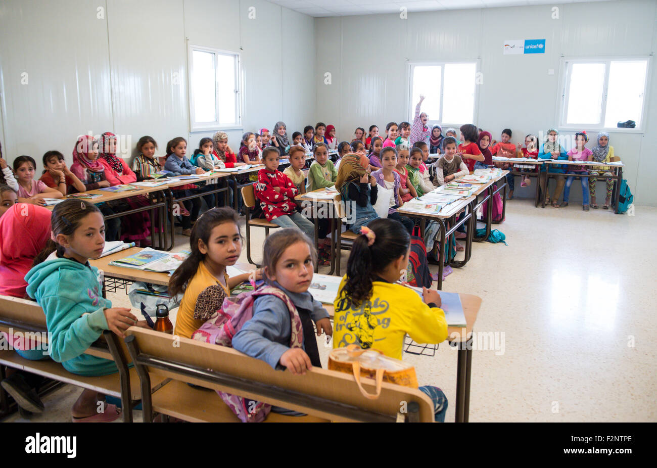 Syrian refugee schildren attend a class at the UNICEF school on the ...