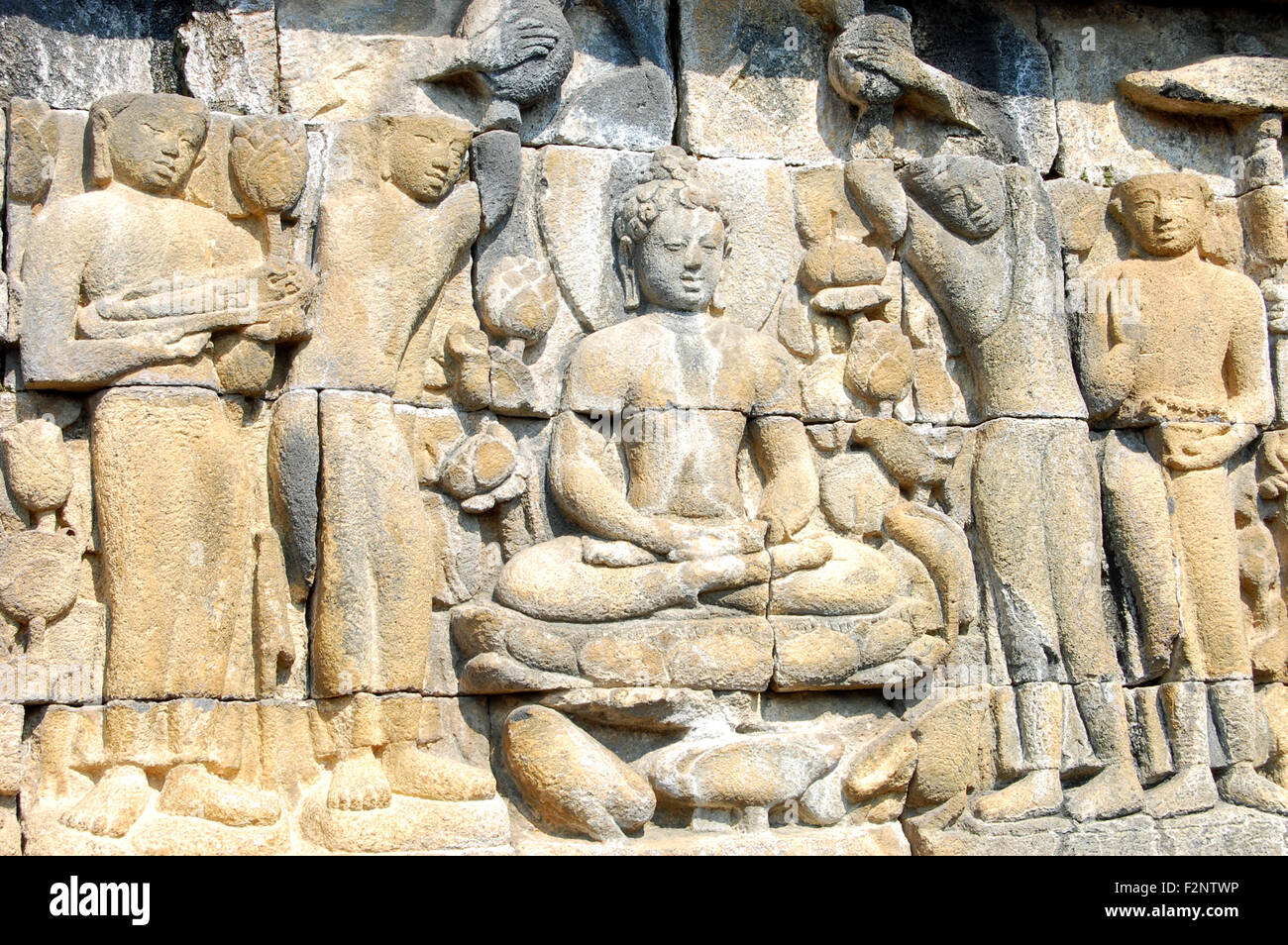 Buddhist narrative panel depicting Buddha on the temple at Borobudur ...