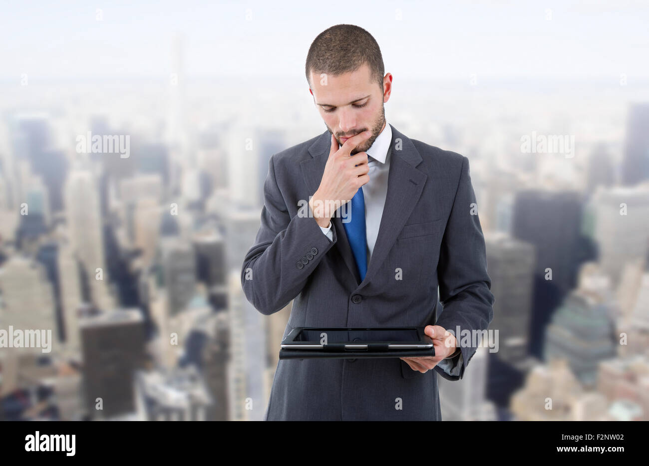 businessman using touch pad of tablet pc, at the office Stock Photo - Alamy