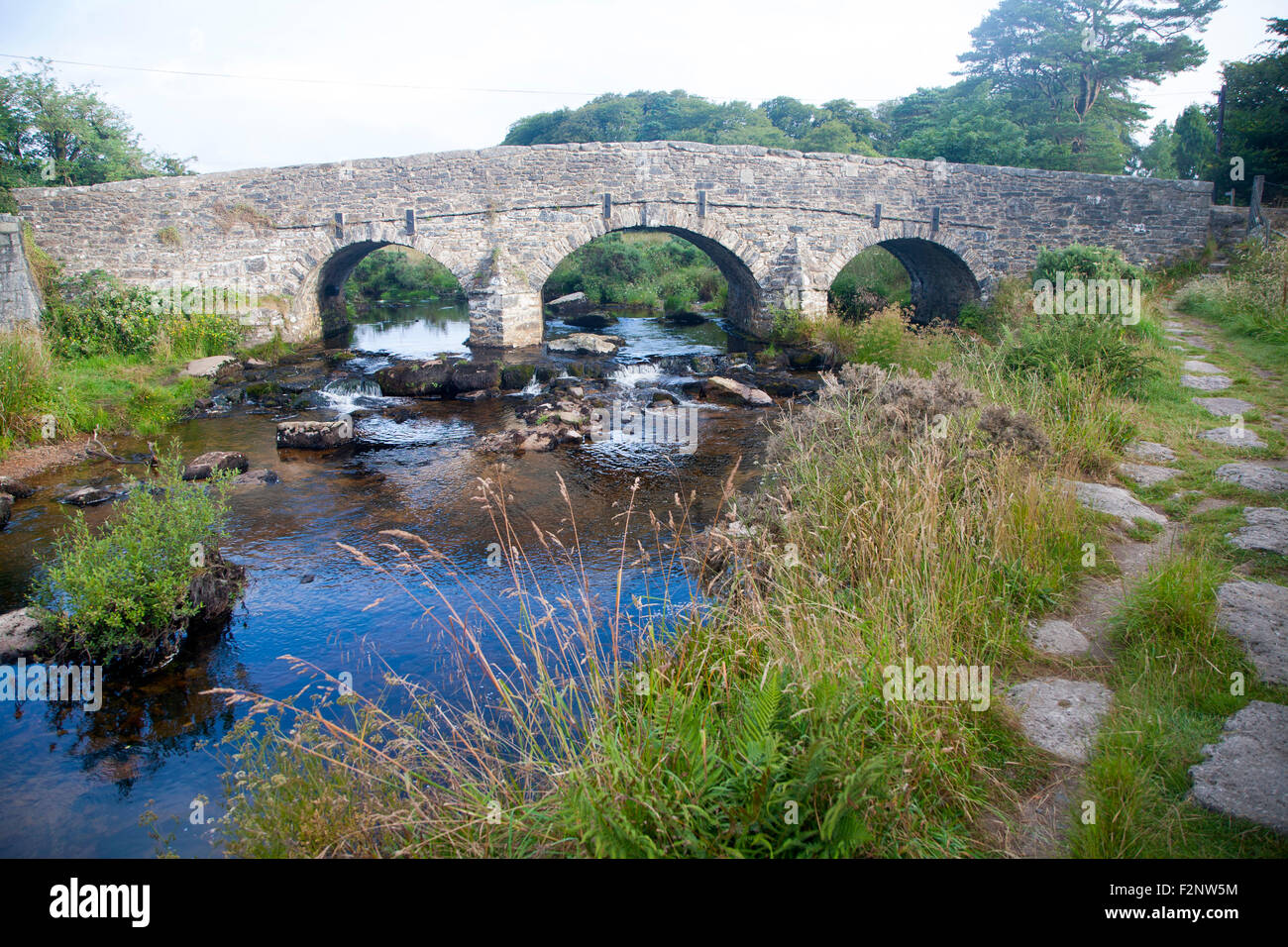 Historic Packhorse bridge at Postbridge, Dartmoor national park, Devon ...